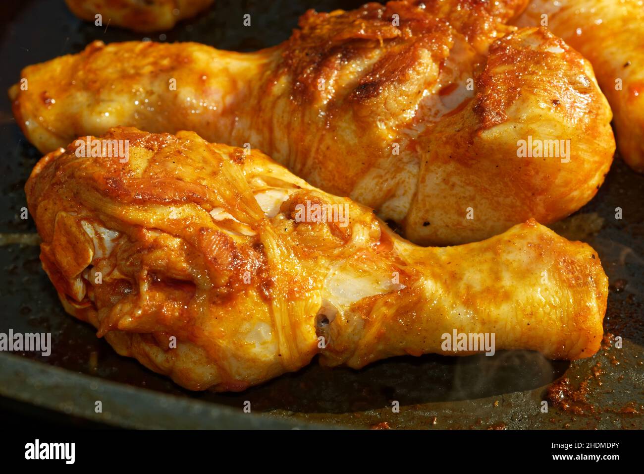 Season chicken thighs hi-res stock photography and images - Alamy