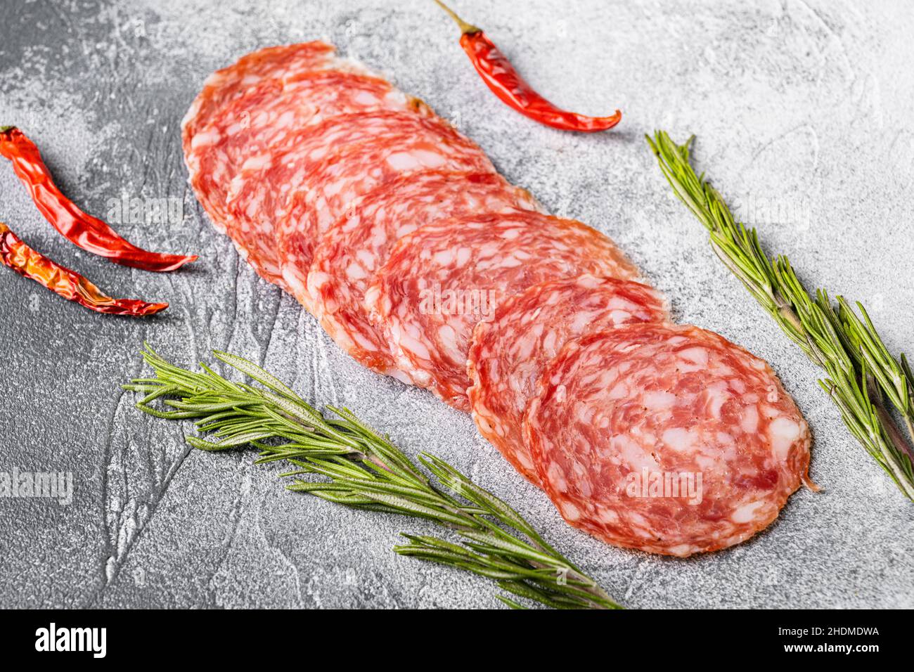 Smoked Sausage Slices Salami set, on gray stone table background Stock ...
