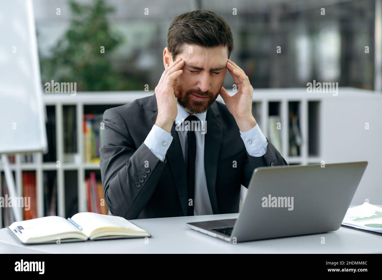 Upset overworked caucasian male company owner, manager or office worker ...