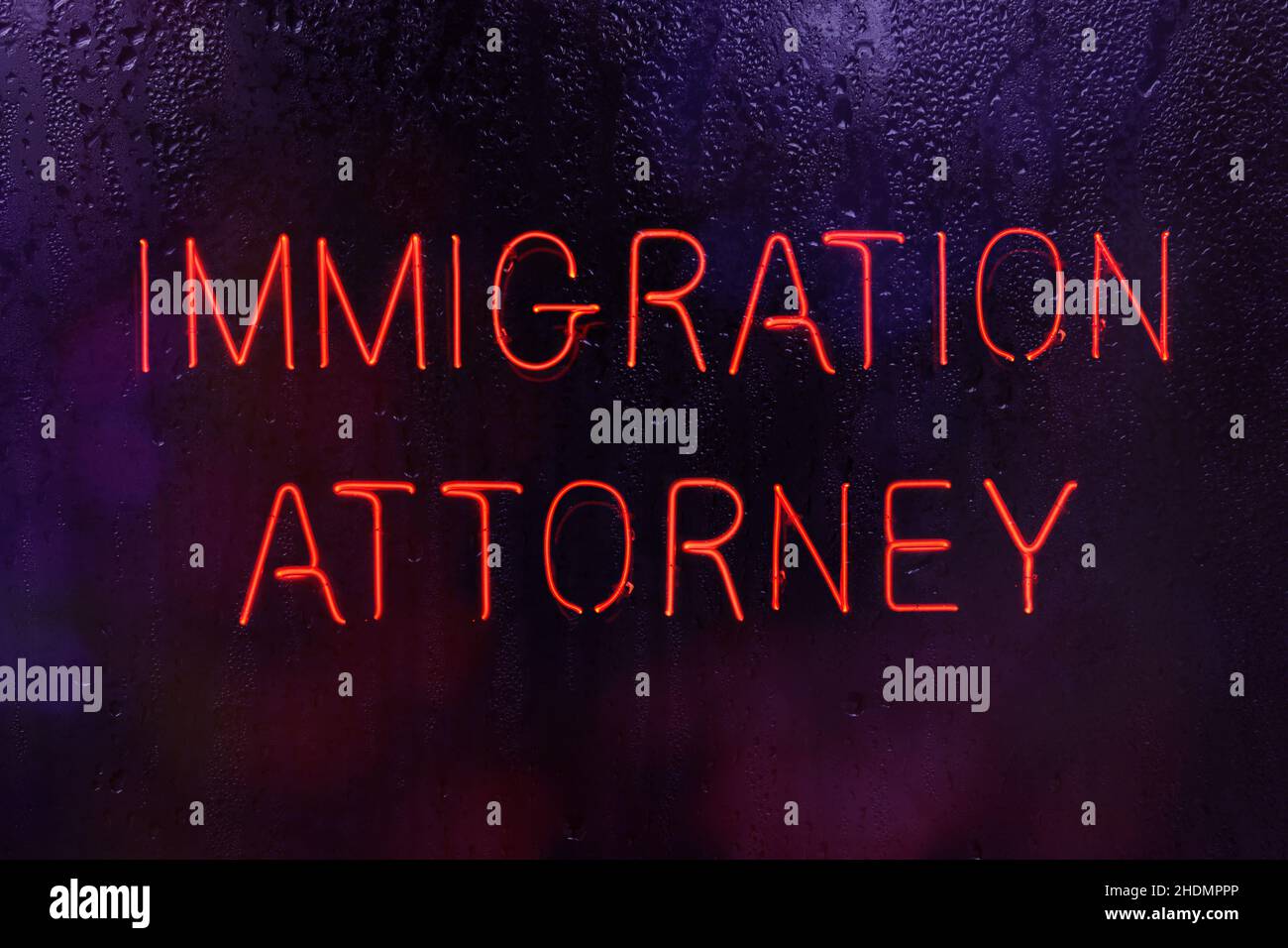 Immigration Attorney Sign in Rainy Window Stock Photo - Alamy