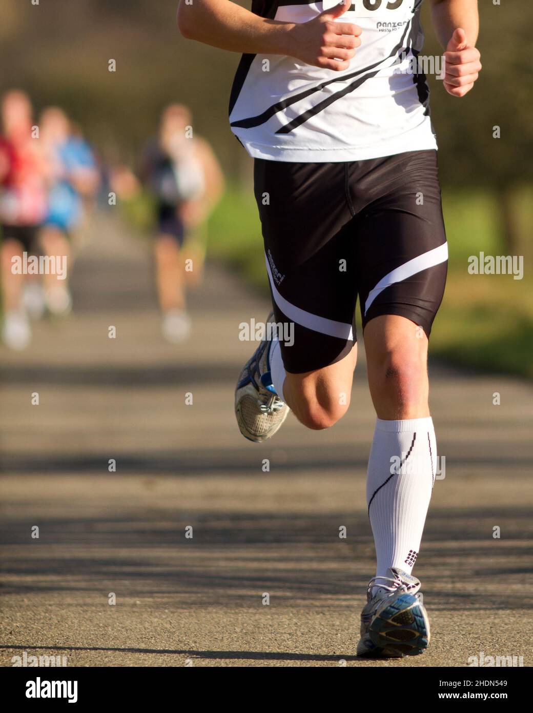Sport legs compression hi-res stock photography and images - Alamy