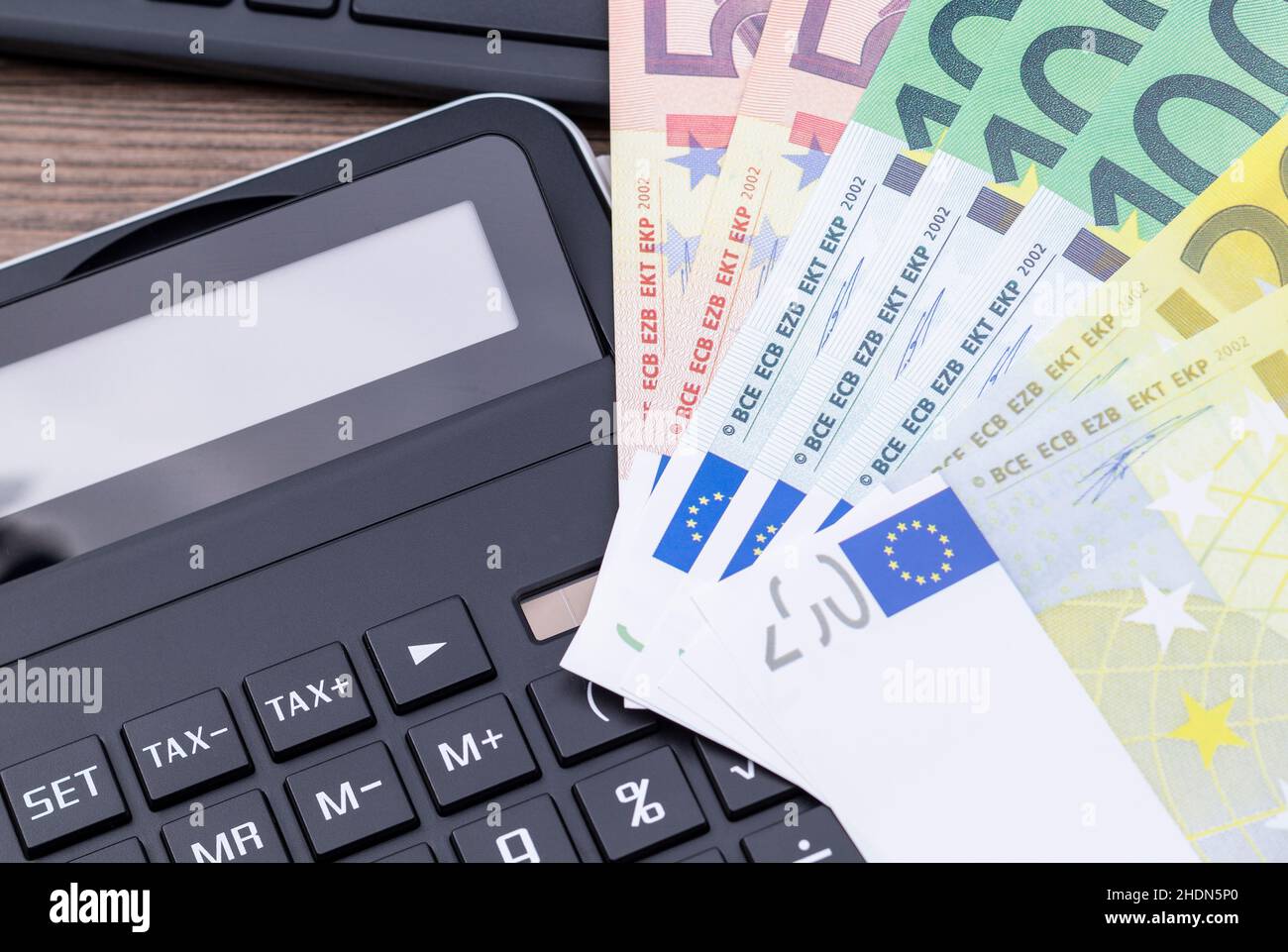 calculator, euro notes, calculators Stock Photo - Alamy