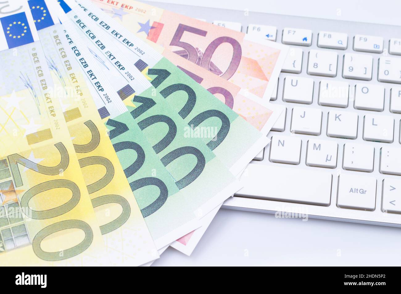 euro notes, computer keyboard, computer keyboards Stock Photo - Alamy