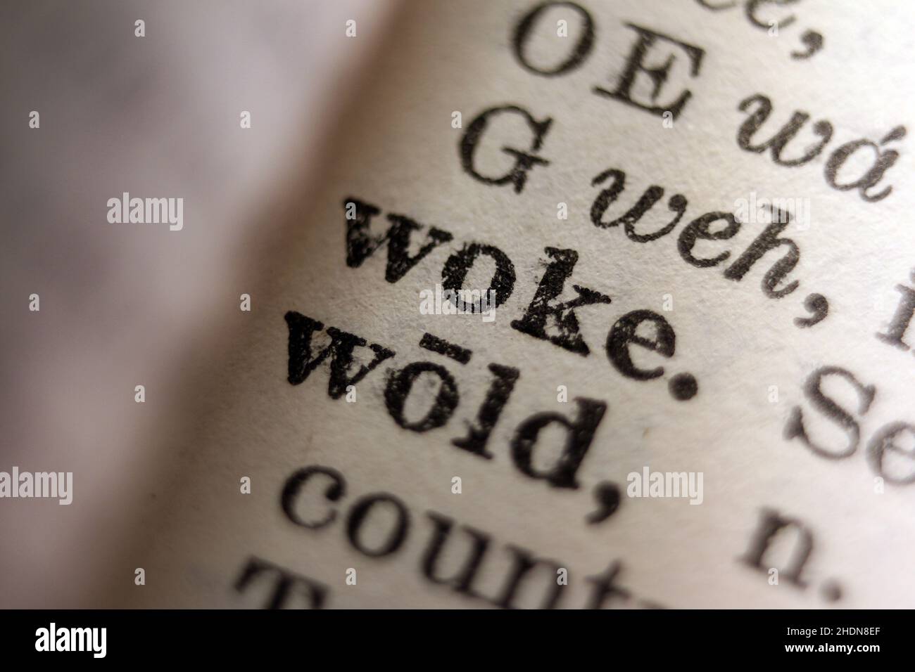 Definition of word woke on dictionary page, close-up Stock Photo - Alamy