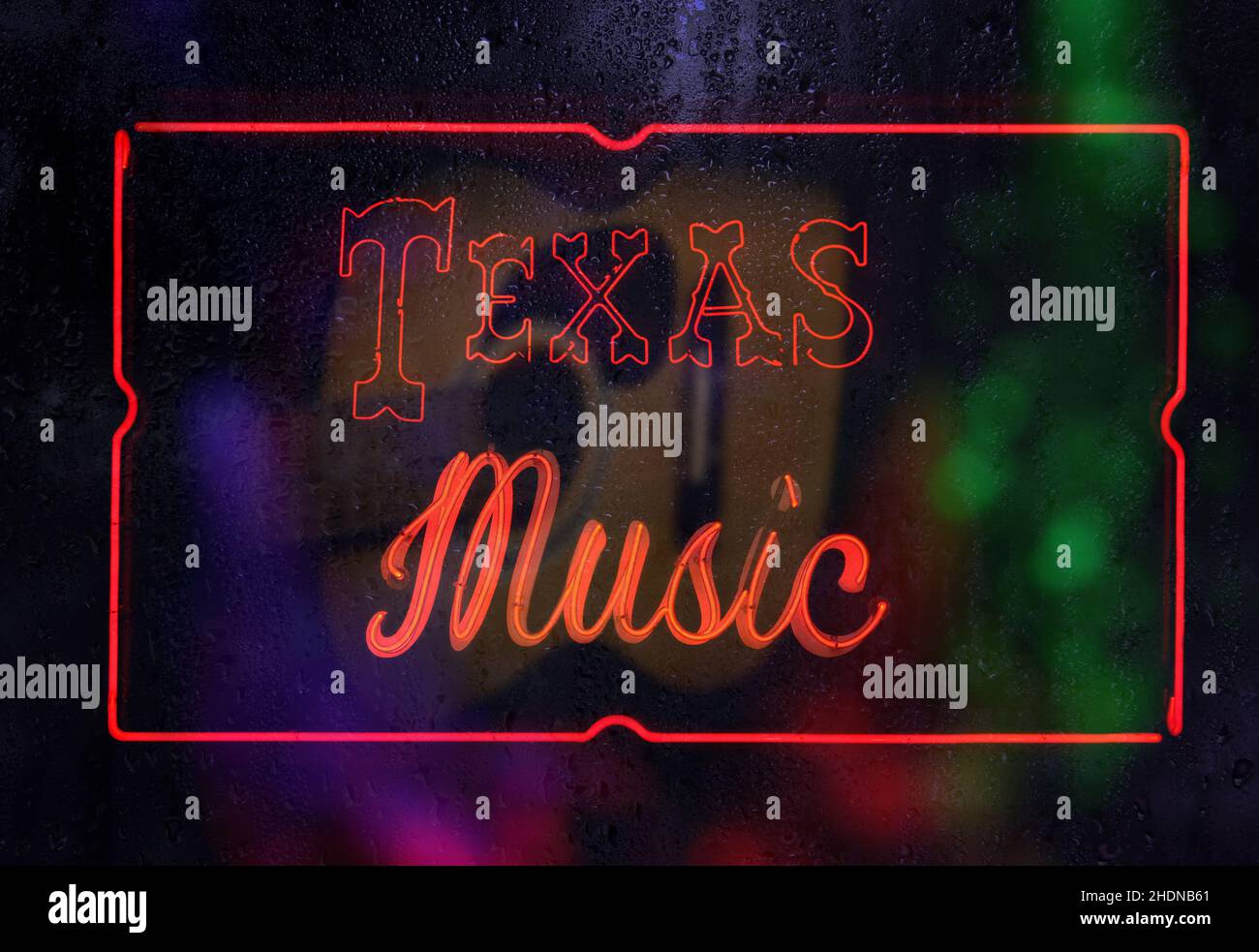 Neon Texas Music Sign in Rainy Wet Window Stock Photo - Alamy