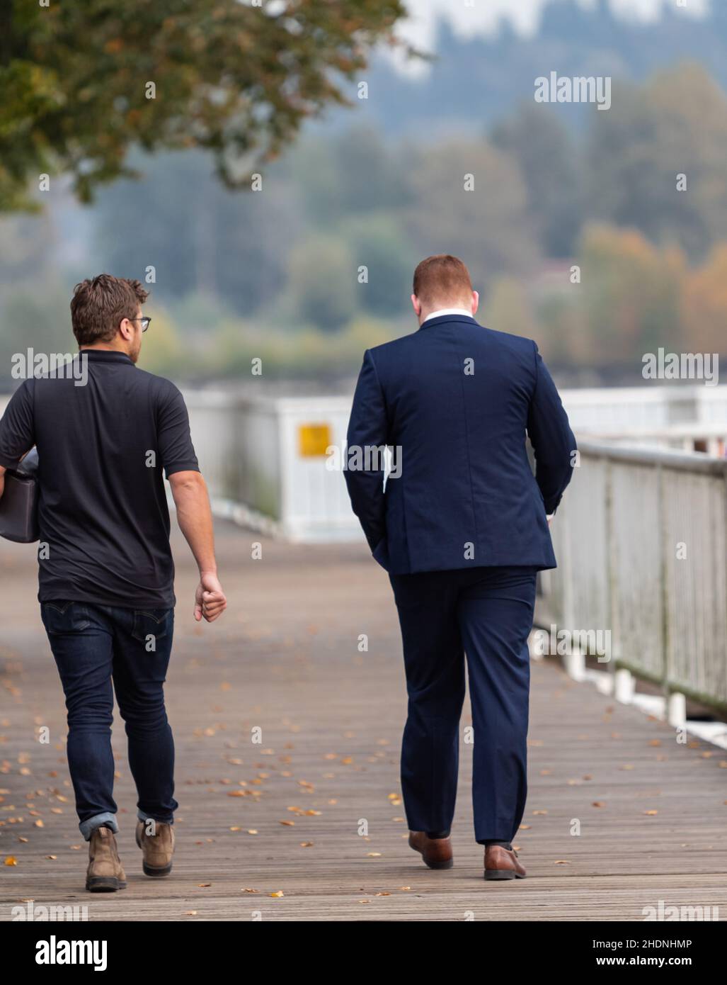 Two friends on walk. wo handsome casual trendy young men, 2 friends, in ...