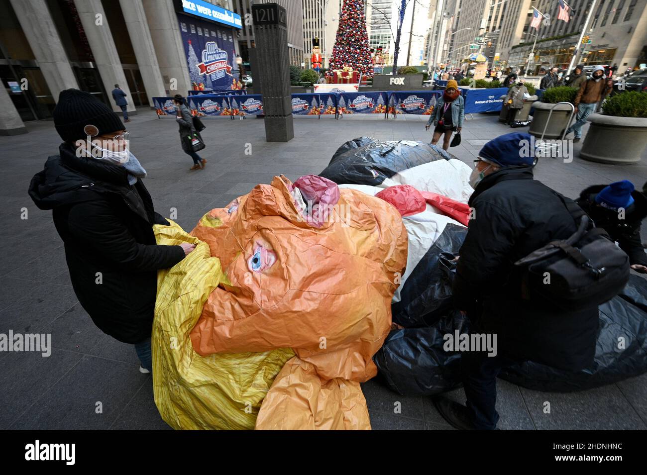 New York, USA. 06th Jan, 2022. A deflated “Trump Rat” is packed up ...
