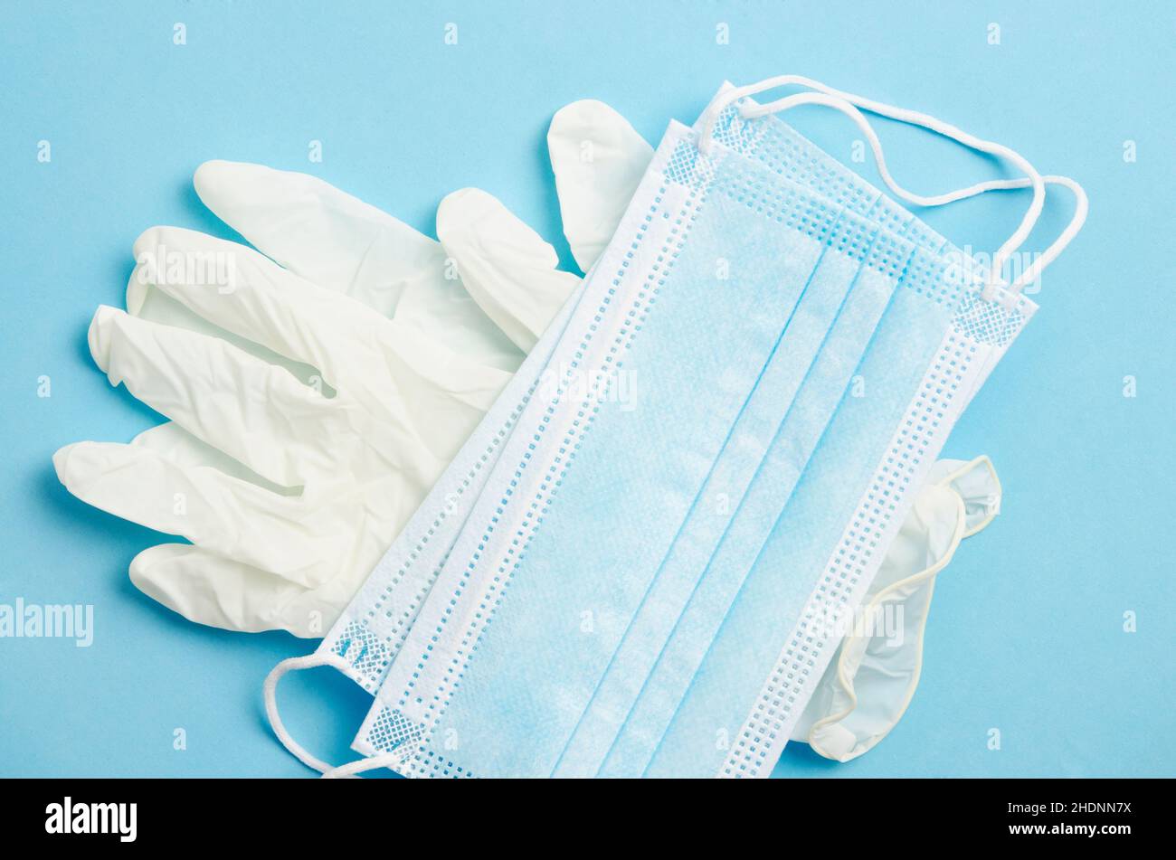 Medical gear protecting against transmittable diseases, on blue ...