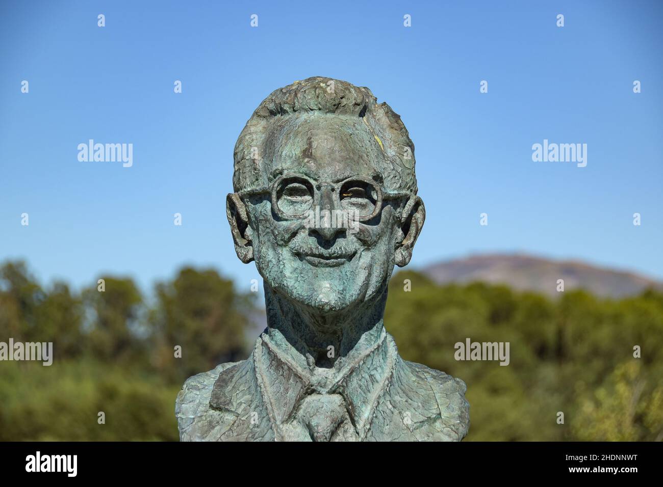 Shallow focus shot of an old man sculpture wearing glasses in Spain ...