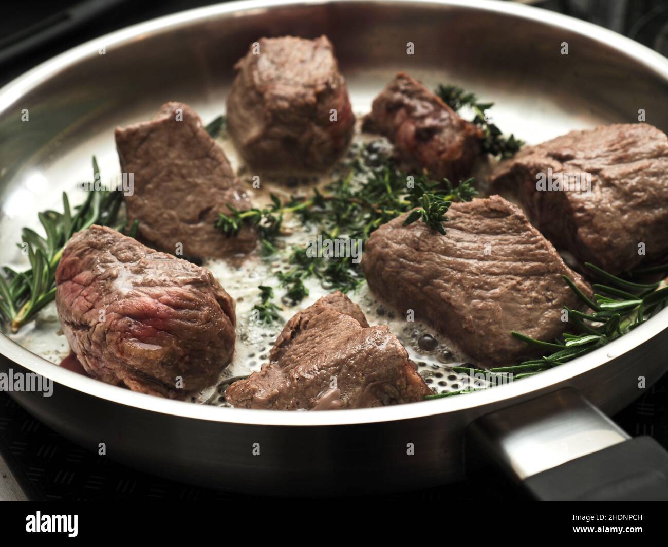 Searing beef hi-res stock photography and images - Alamy