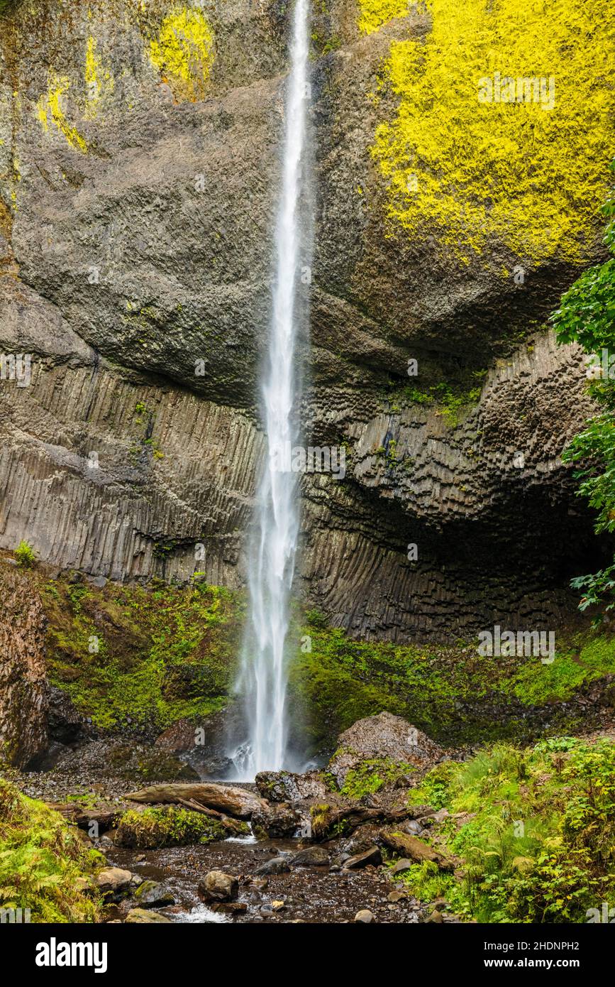 Latourell Falls, located in the Columbia River Gorge in Oregon, plunges ...