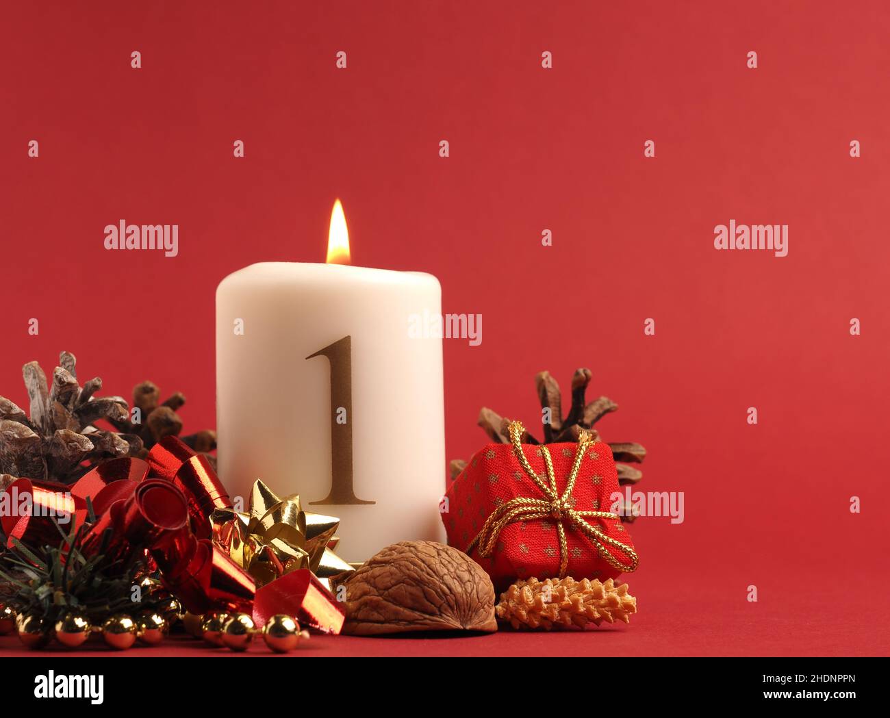 First candle is burning hi-res stock photography and images - Alamy