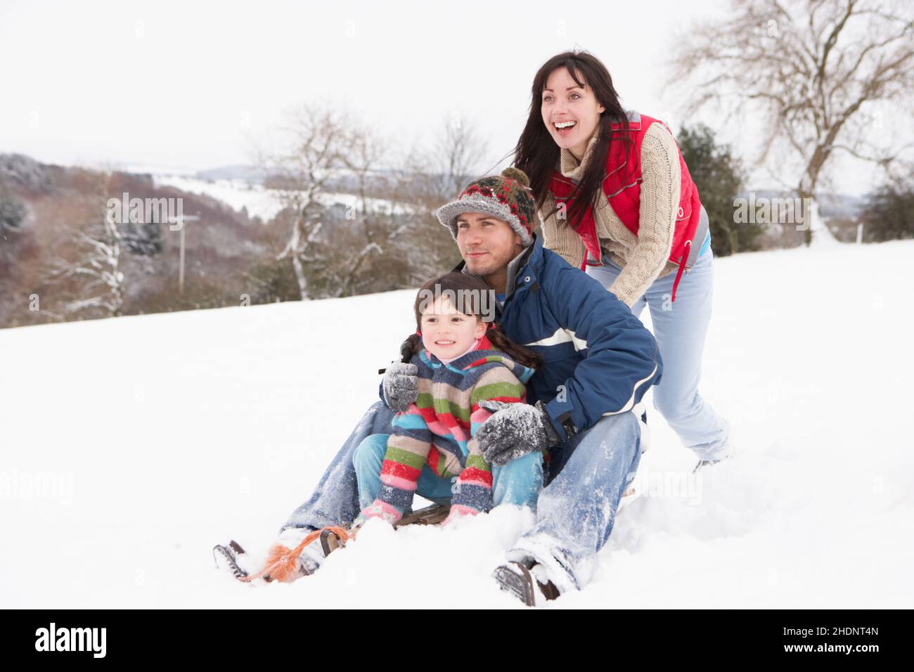 sledding, family, sledging, families, tobogganing Stock Photo - Alamy