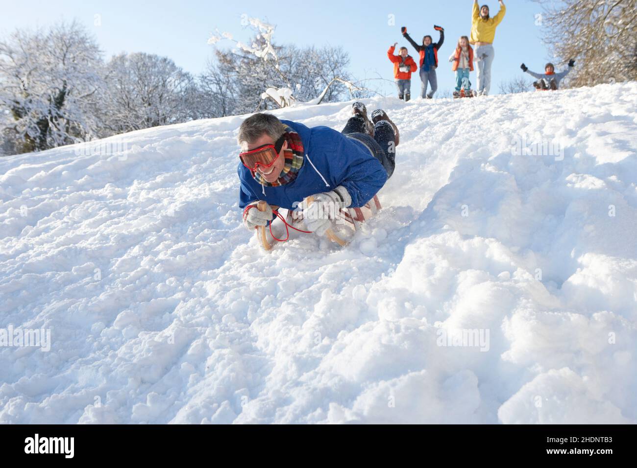 man, sledding, sledging, guy, men, tobogganing Stock Photo - Alamy