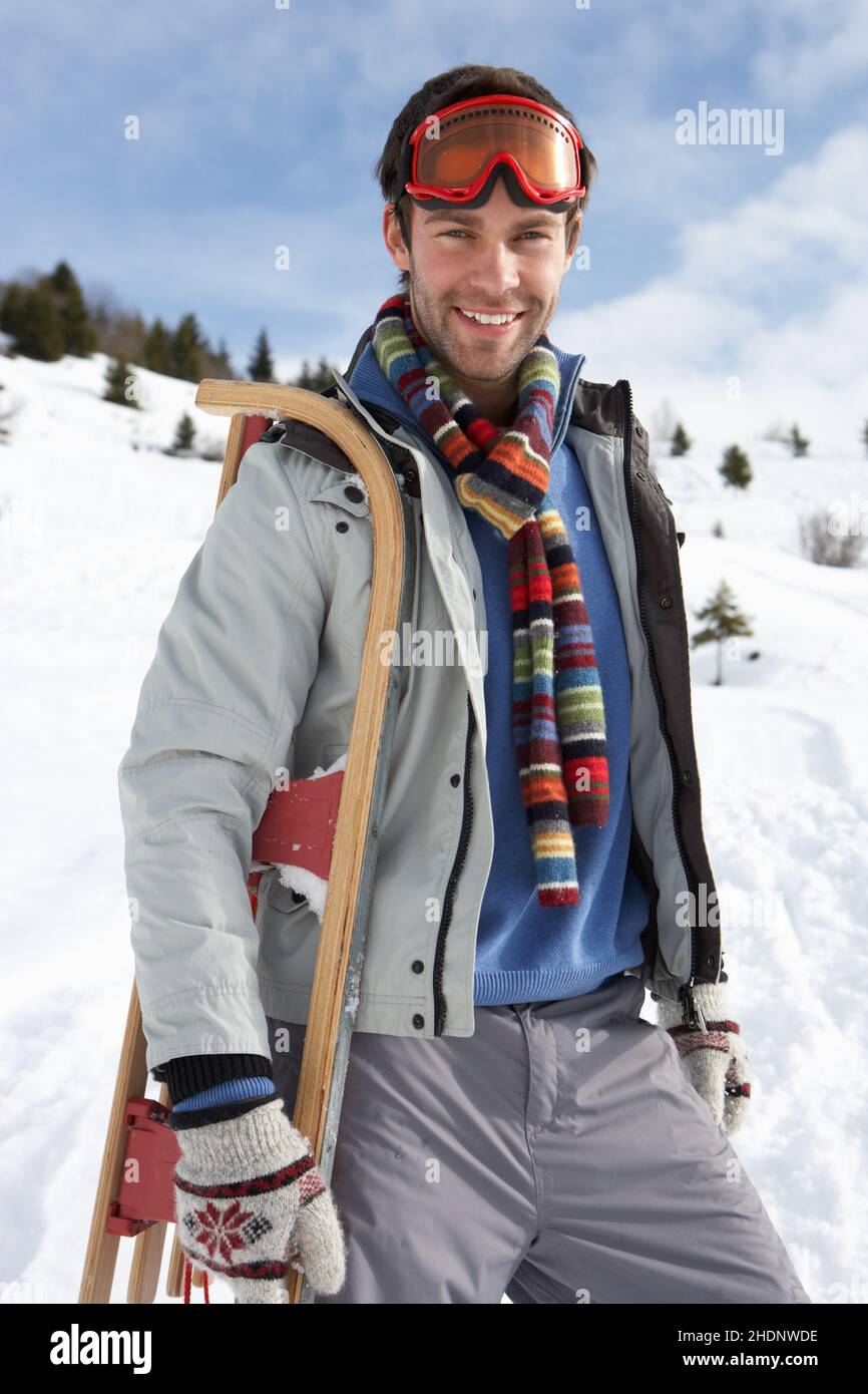 young man, sledding, winter holidays, guy, man, men, young Stock Photo ...