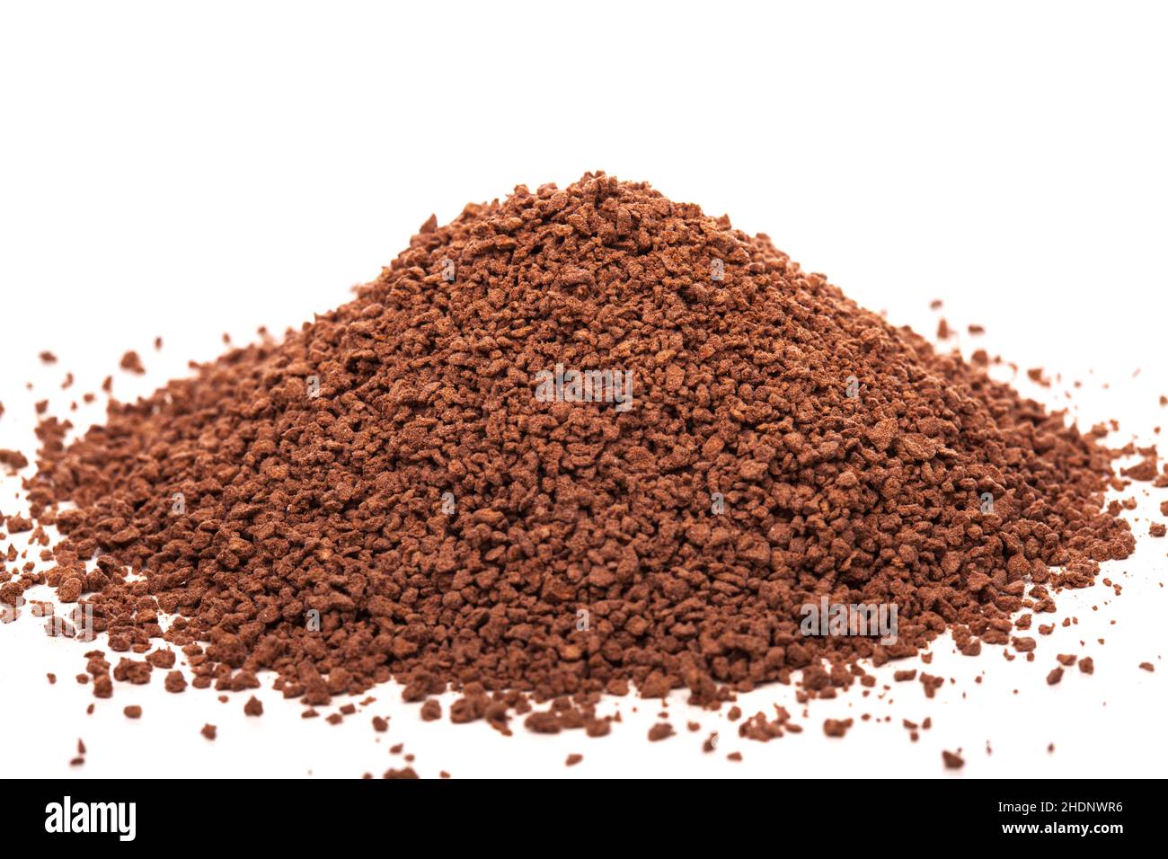 Pile of cocoa powder isolated on white background Stock Photo - Alamy