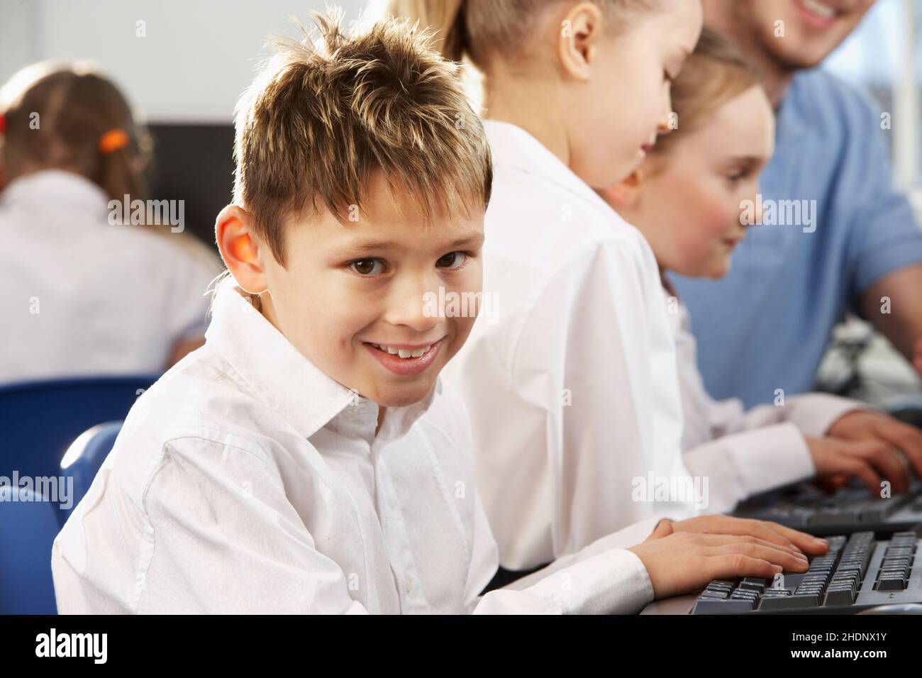 Computer school pupils uniform hi-res stock photography and images - Alamy