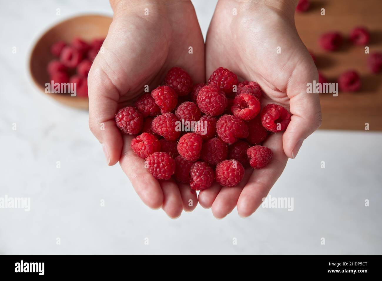 Handfuls of berries hi-res stock photography and images - Alamy