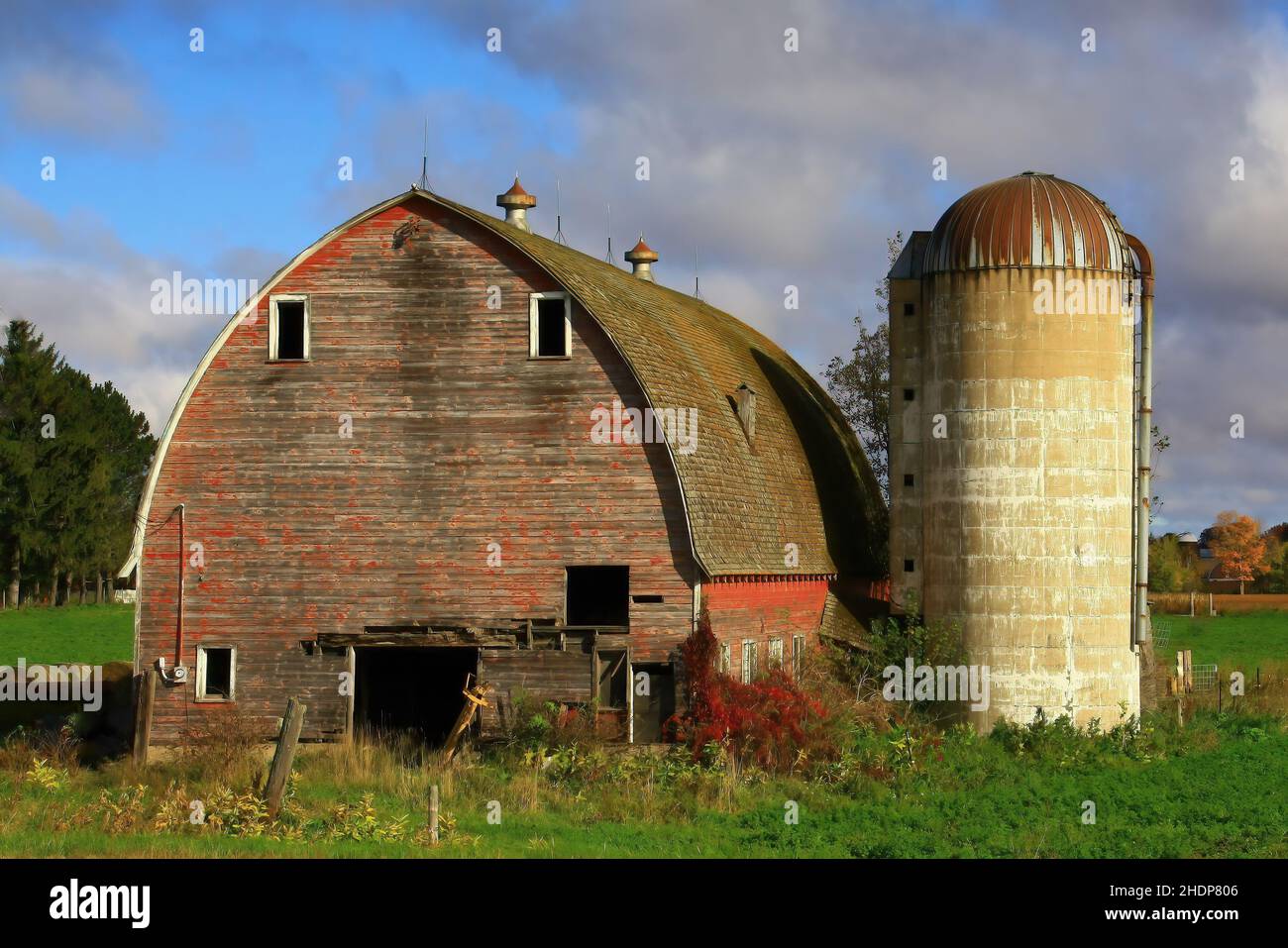 Rustic red barn and silo in the fall of the year.- Oct. 2, 2010 Stock ...