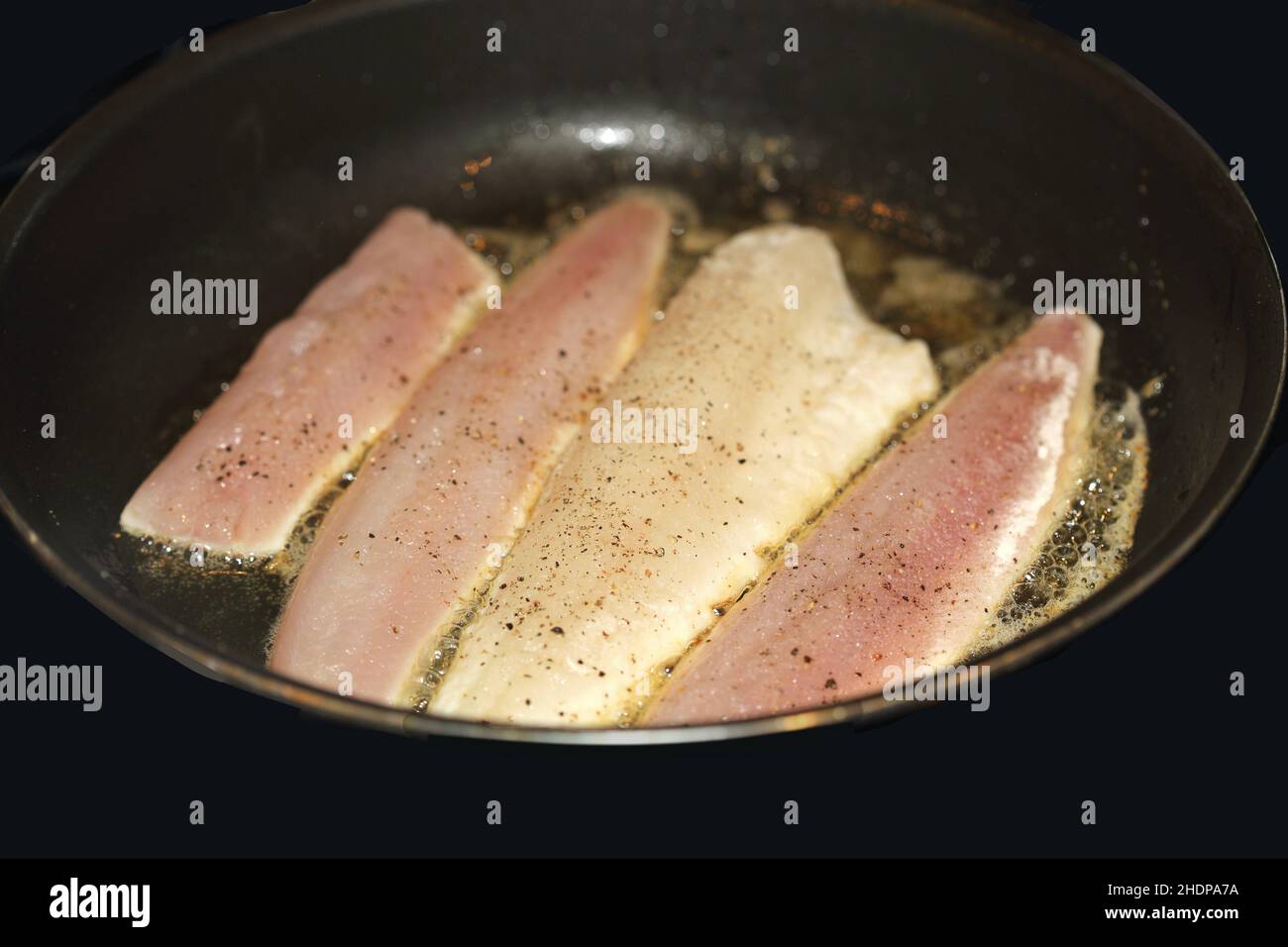 fish fillet, searing, Blue whitefish, fish fillets Stock Photo - Alamy