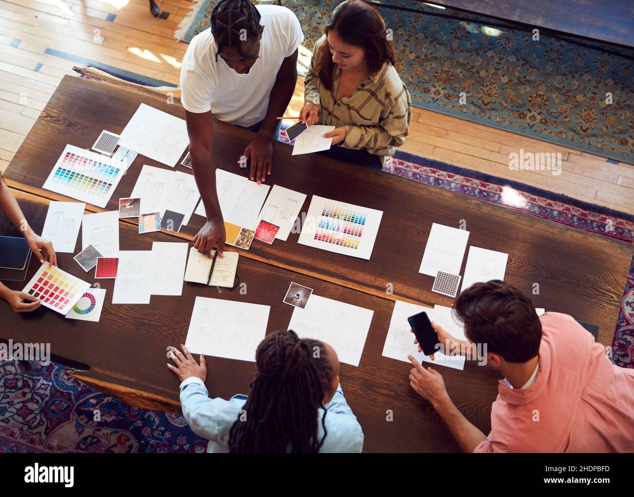 Young creatives team working together hi-res stock photography and ...