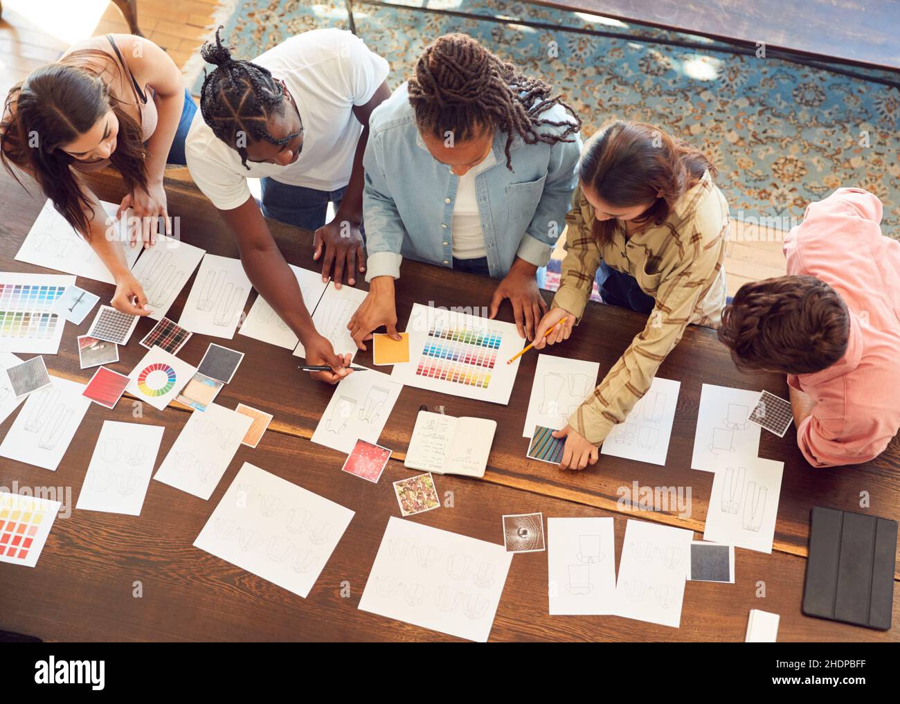 Young creatives team working together hi-res stock photography and ...