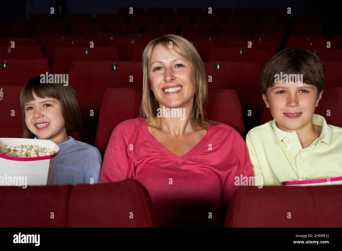 Child family cinema hi-res stock photography and images - Alamy