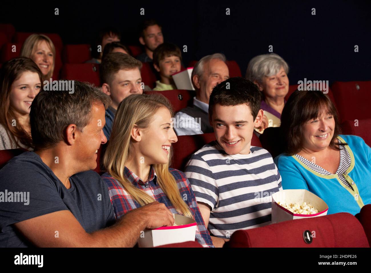 Movie theaters watching hi-res stock photography and images - Alamy