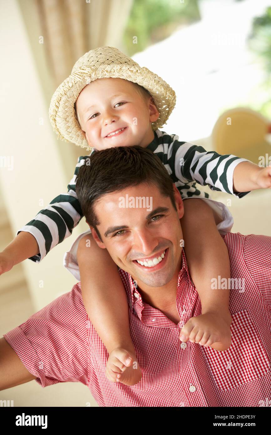 Men baby boy piggyback hi-res stock photography and images - Alamy