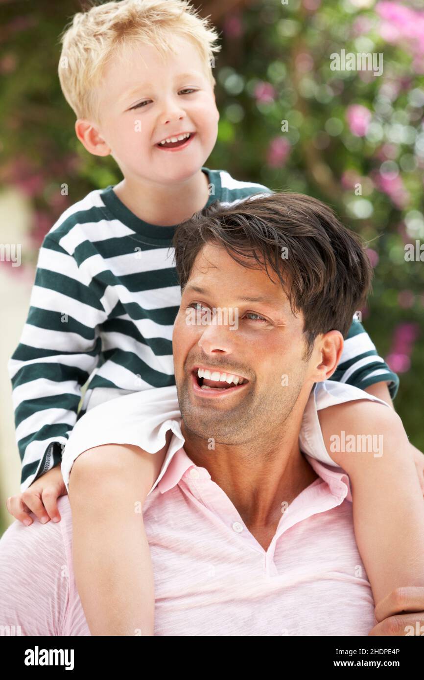 Men baby boy piggyback hi-res stock photography and images - Alamy