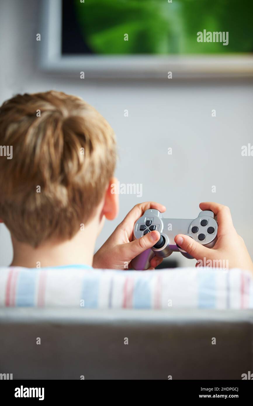 Guy playing video games rear view hi-res stock photography and images ...