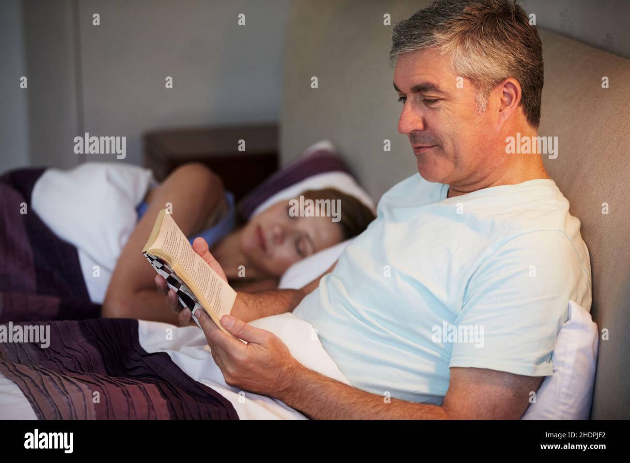 Guy bed sleep sleeping reading hi-res stock photography and images - Alamy