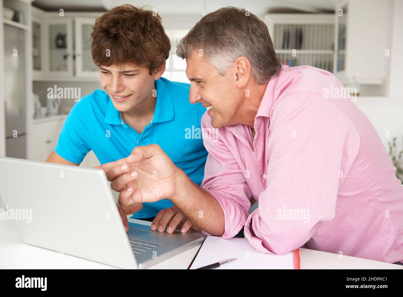 Father and son with computers hi-res stock photography and images - Alamy