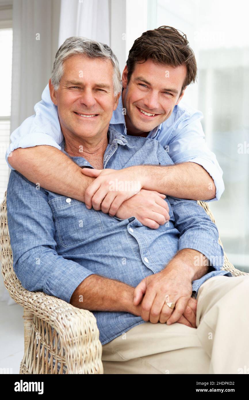 Father Embracing Son Dad Fathers Cuddling Hug Hugging Sons