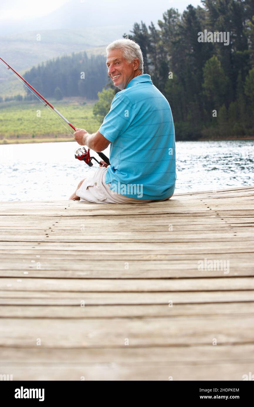 Old guy fishing hi-res stock photography and images - Alamy