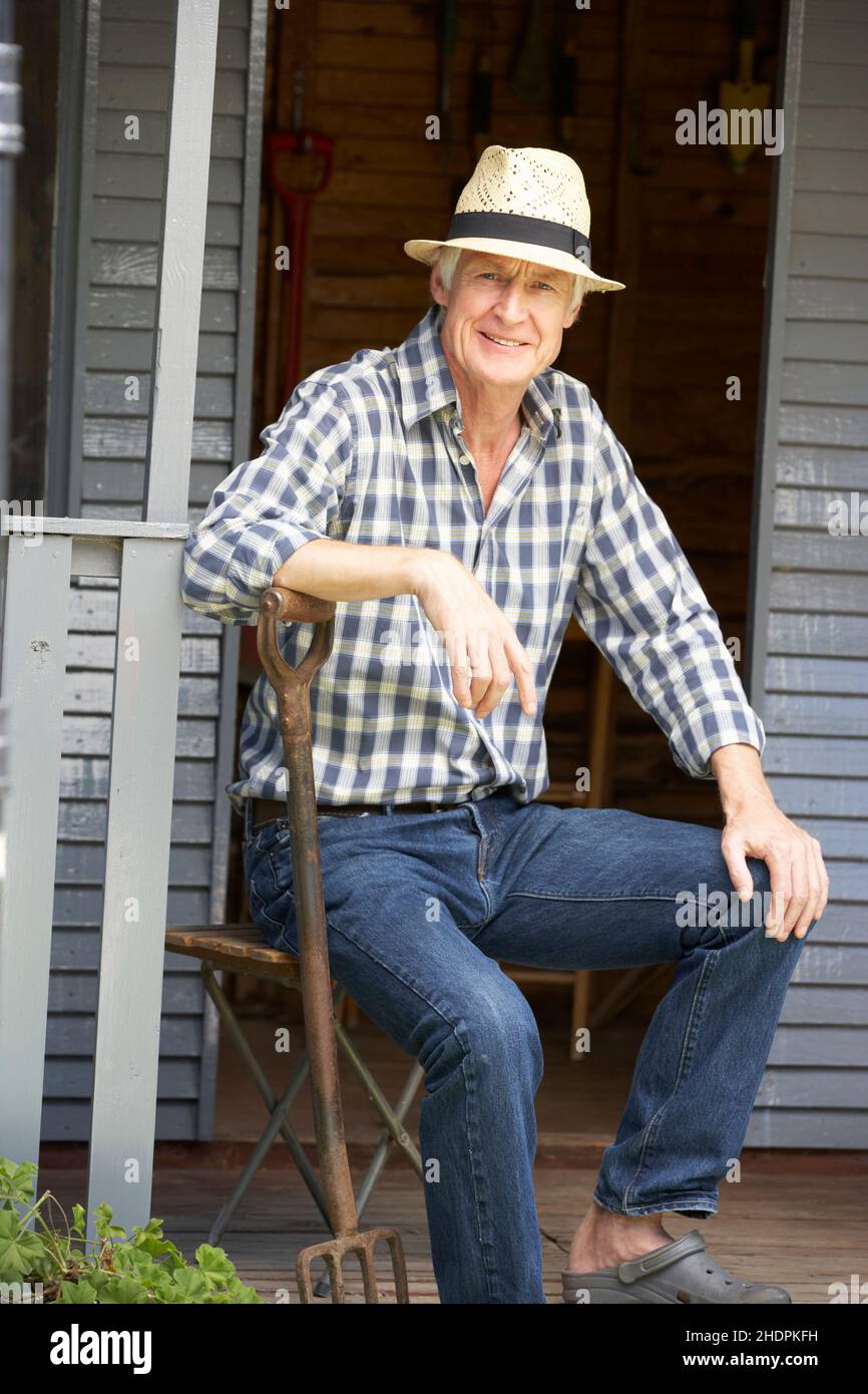 Senior male person in hat looking hi-res stock photography and images ...