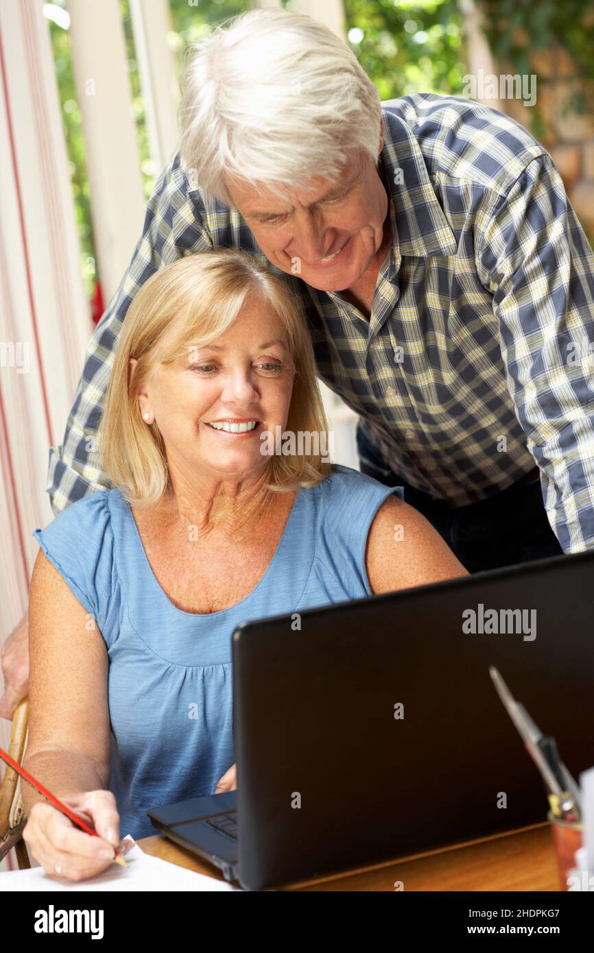 Old adults at computers hi-res stock photography and images - Alamy