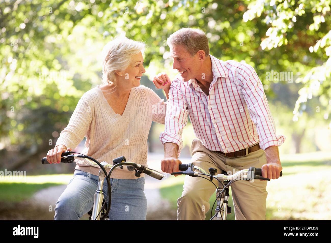 cycling, couple, older couple, couples, older couples Stock Photo - Alamy