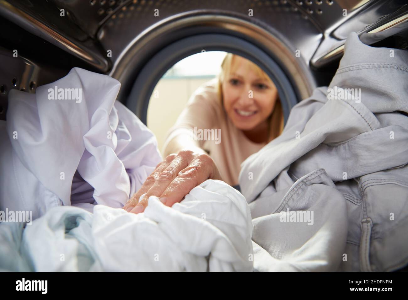 Laundry lady hi-res stock photography and images - Alamy