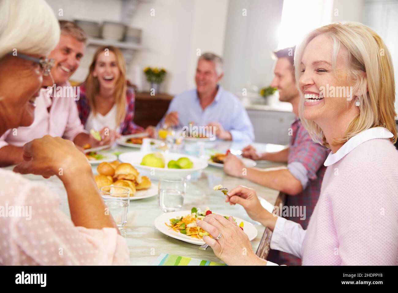 6 adults table hi-res stock photography and images - Alamy