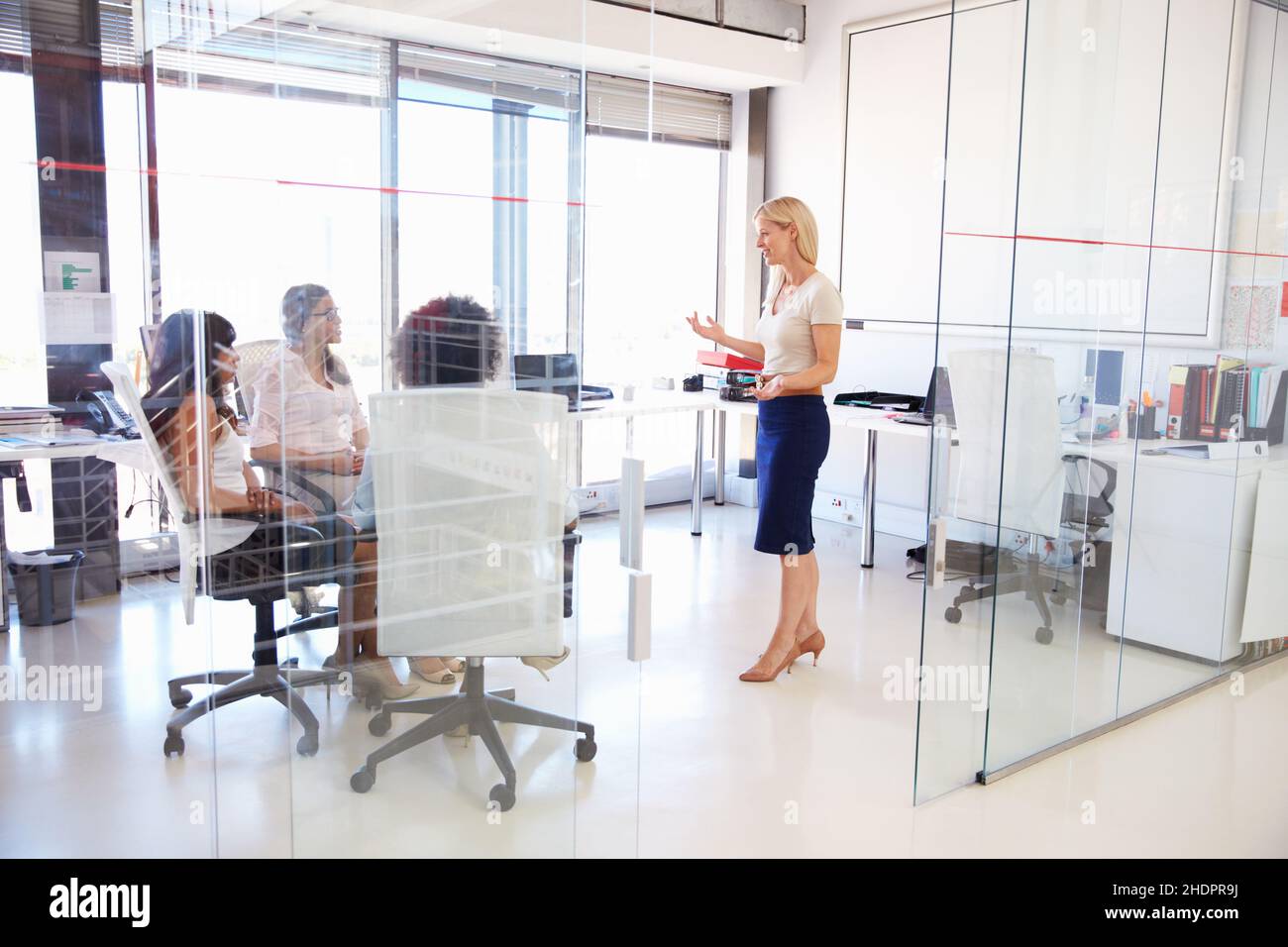 Girl present boardroom hi-res stock photography and images - Alamy