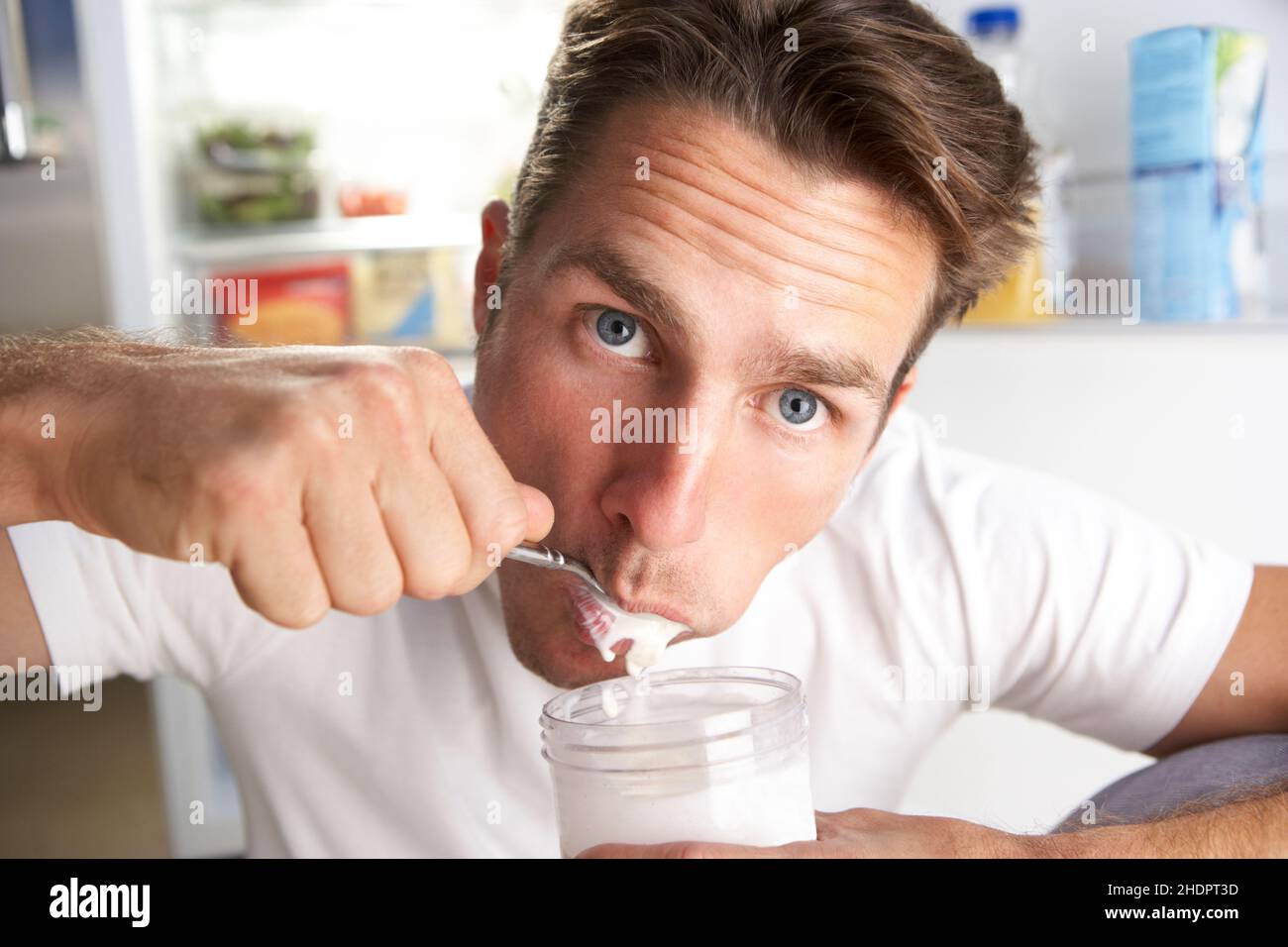 man, eating, yogurt, hot hunger, guy, men, eat, hungers Stock Photo - Alamy