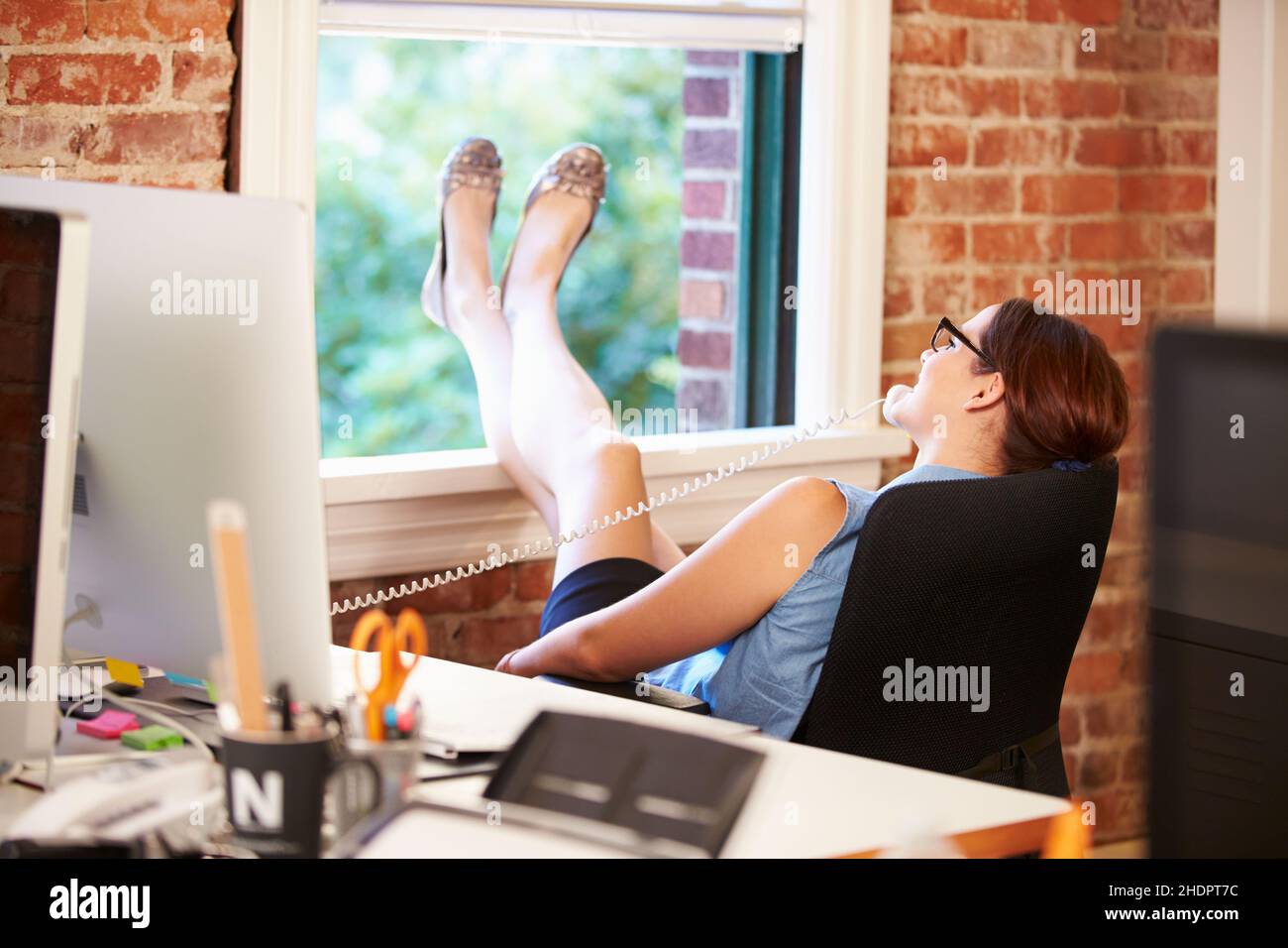 Put away woman at home hi-res stock photography and images - Alamy