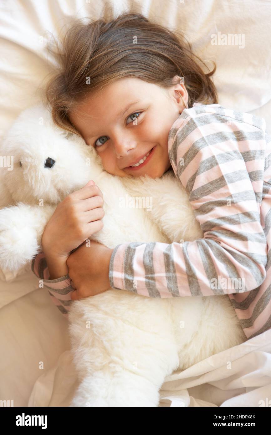 girl, cuddle, soft toy, girls, cuddles, soft toys Stock Photo - Alamy