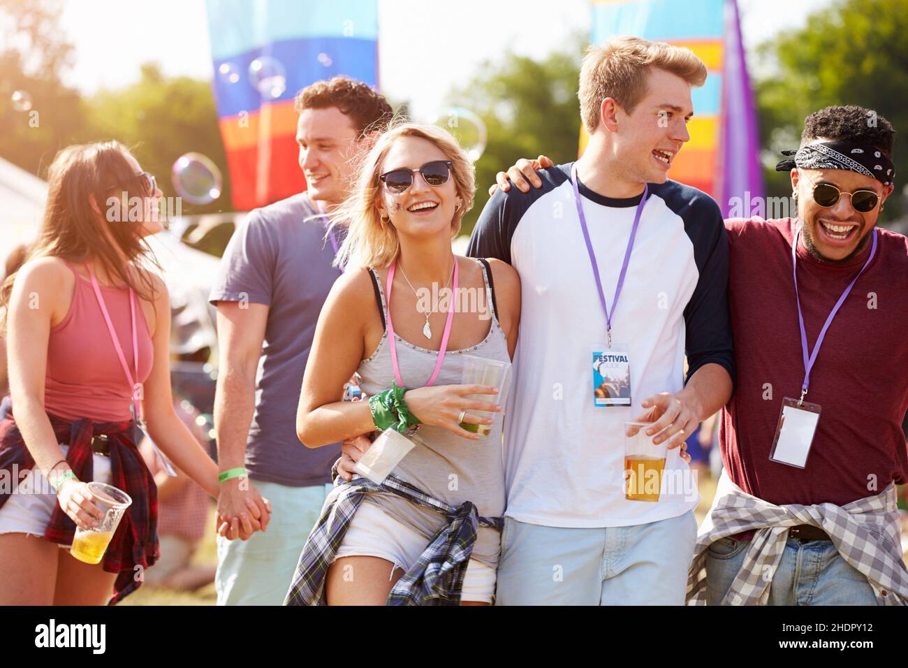 Festival goer three quarter length hi-res stock photography and images ...