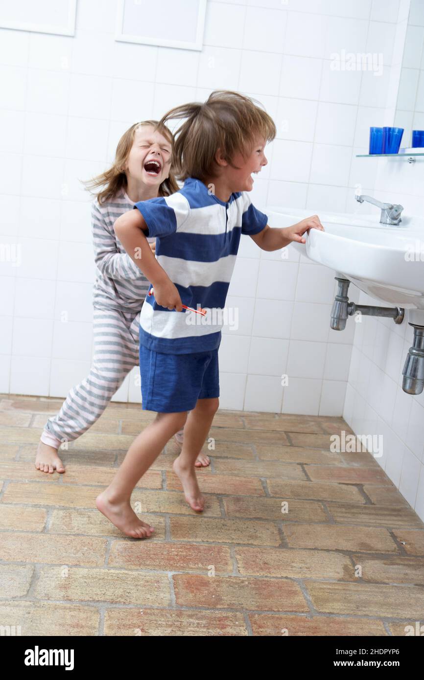 laughing, bathroom, siblings, laugh, smiling, bathrooms Stock Photo - Alamy