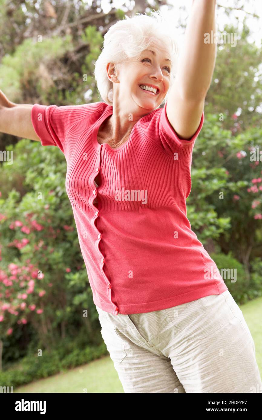 Happy jumping older people hi-res stock photography and images - Alamy