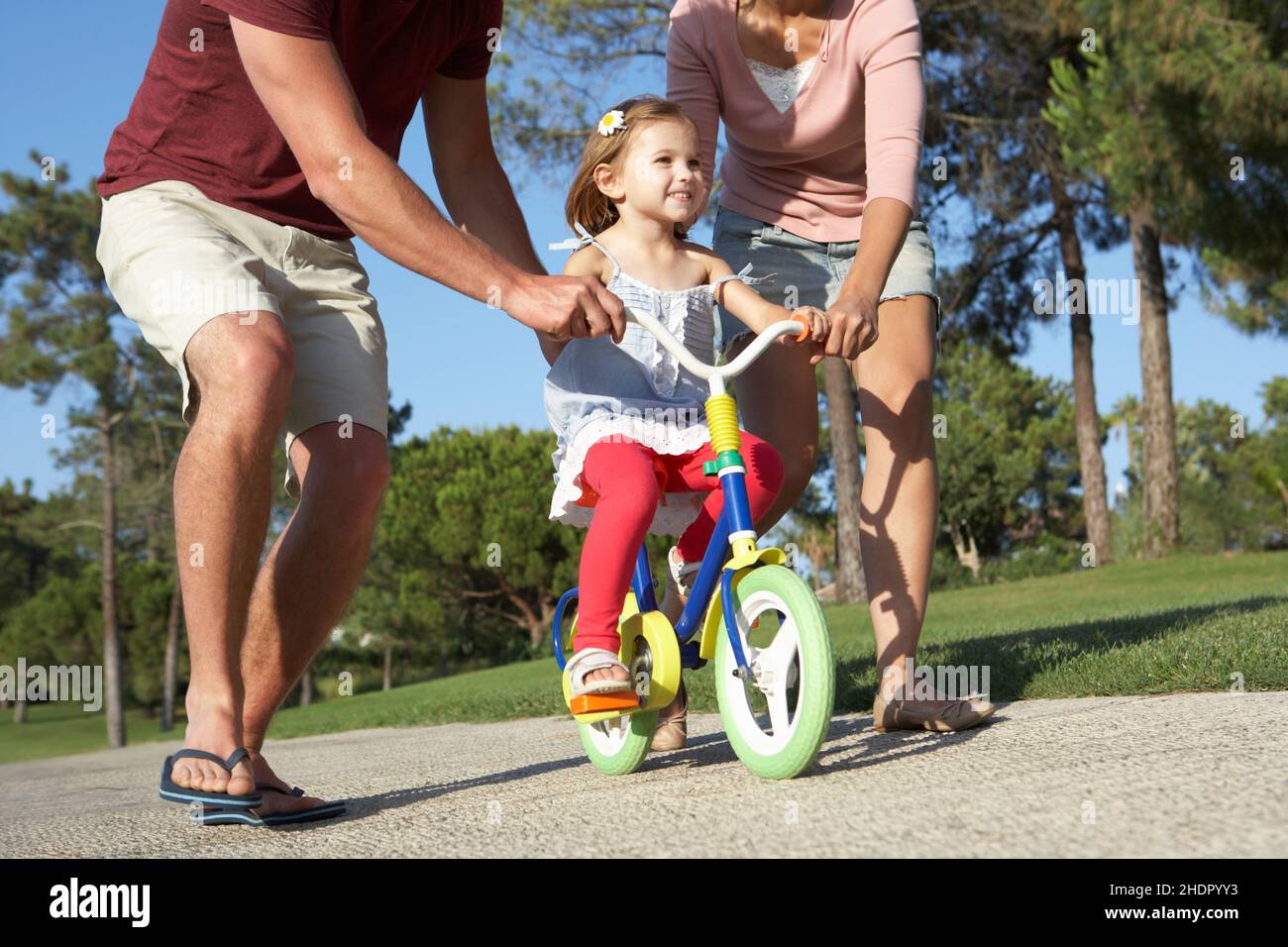 Middle aged woman learning bicycle hi-res stock photography and images ...
