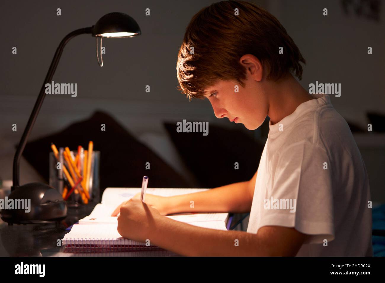 Boy homework lamp hi-res stock photography and images - Alamy