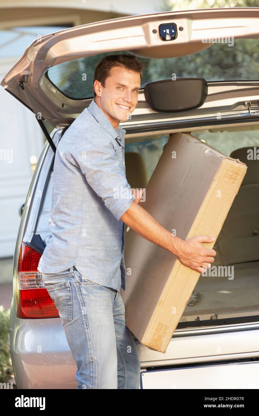 man, car, package, loading, guy, men, cars, packages Stock Photo - Alamy
